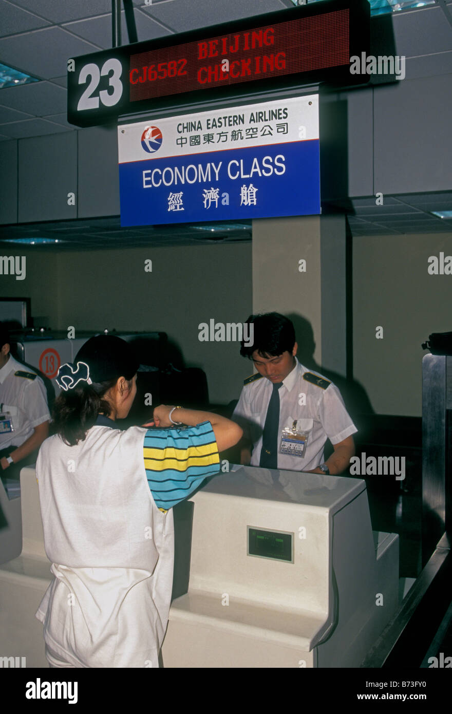 People tourist traveler at check in counter at Hongqiao International ...