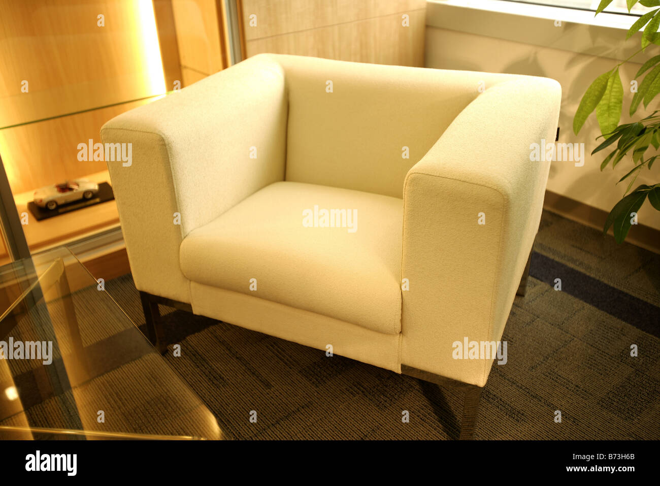 Reception room Sofa Pot plant Stock Photo - Alamy