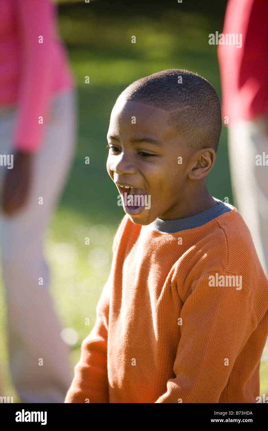 African American boy laughing outdoors Stock Photo - Alamy