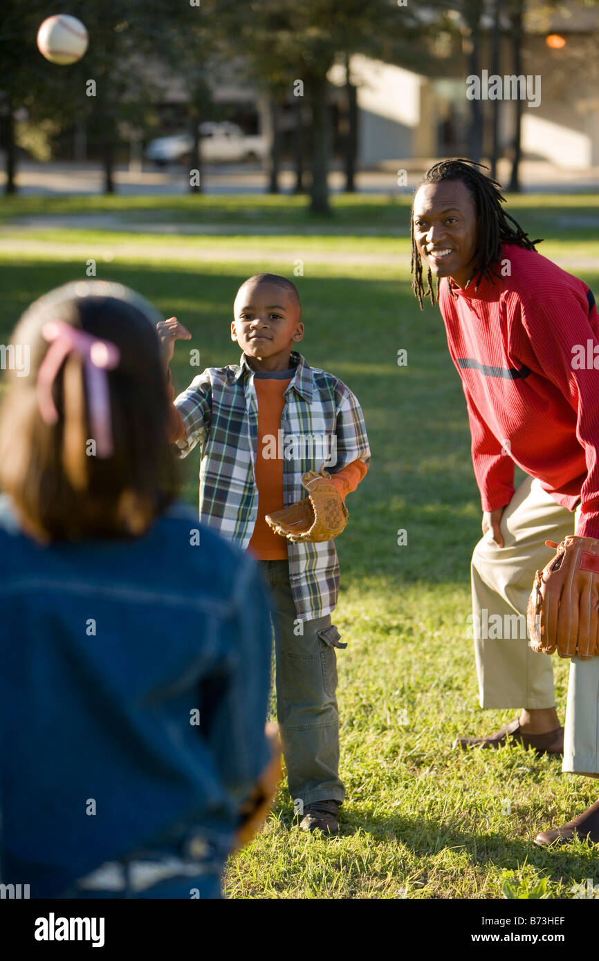Family playing softball hi-res stock photography and images - Alamy