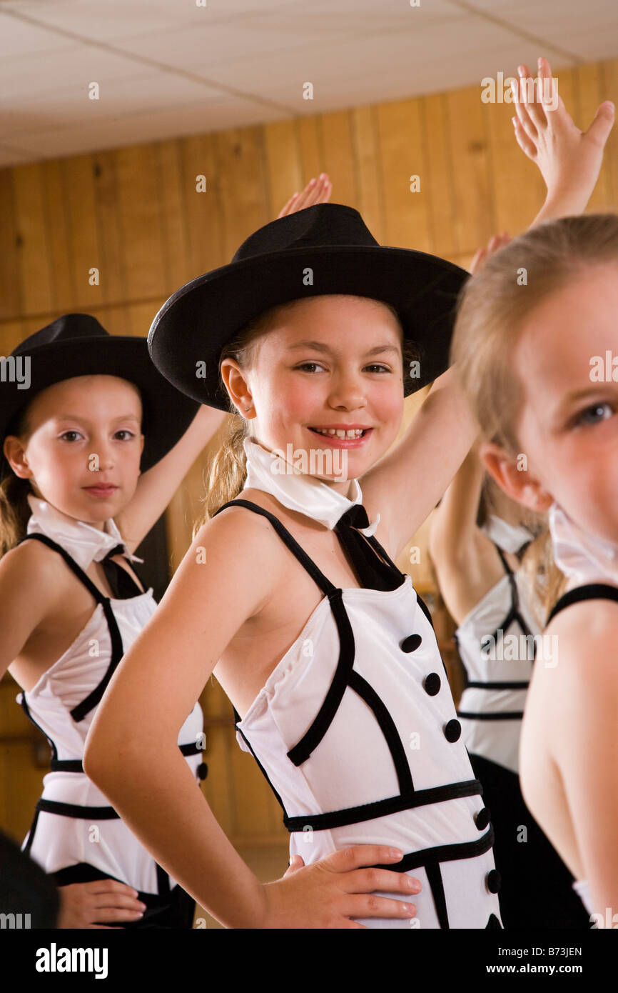 Girls performing dance routine in costume Stock Photo - Alamy