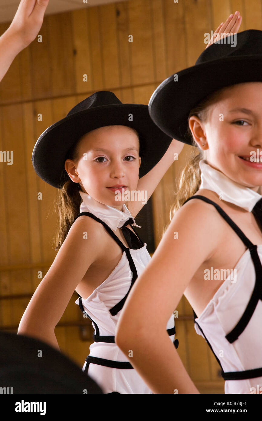 Girls performing dance routine in costume Stock Photo - Alamy