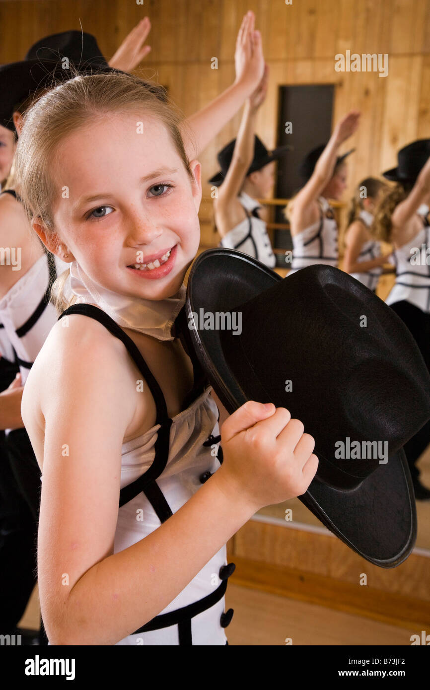 Girls performing dance routine in costume Stock Photo - Alamy