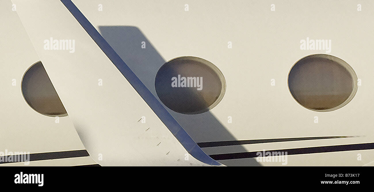 Jet Aircraft windows and wing Stock Photo - Alamy