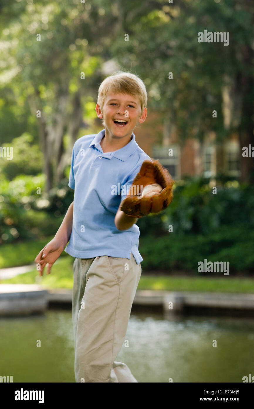 Boy catching ball baseball hi-res stock photography and images - Alamy