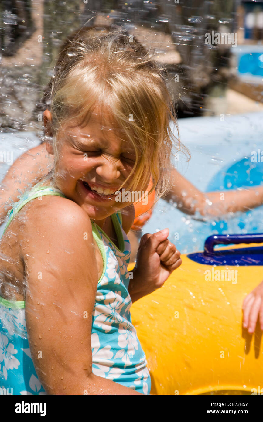 Close-up of girl having fun at water park Stock Photo - Alamy
