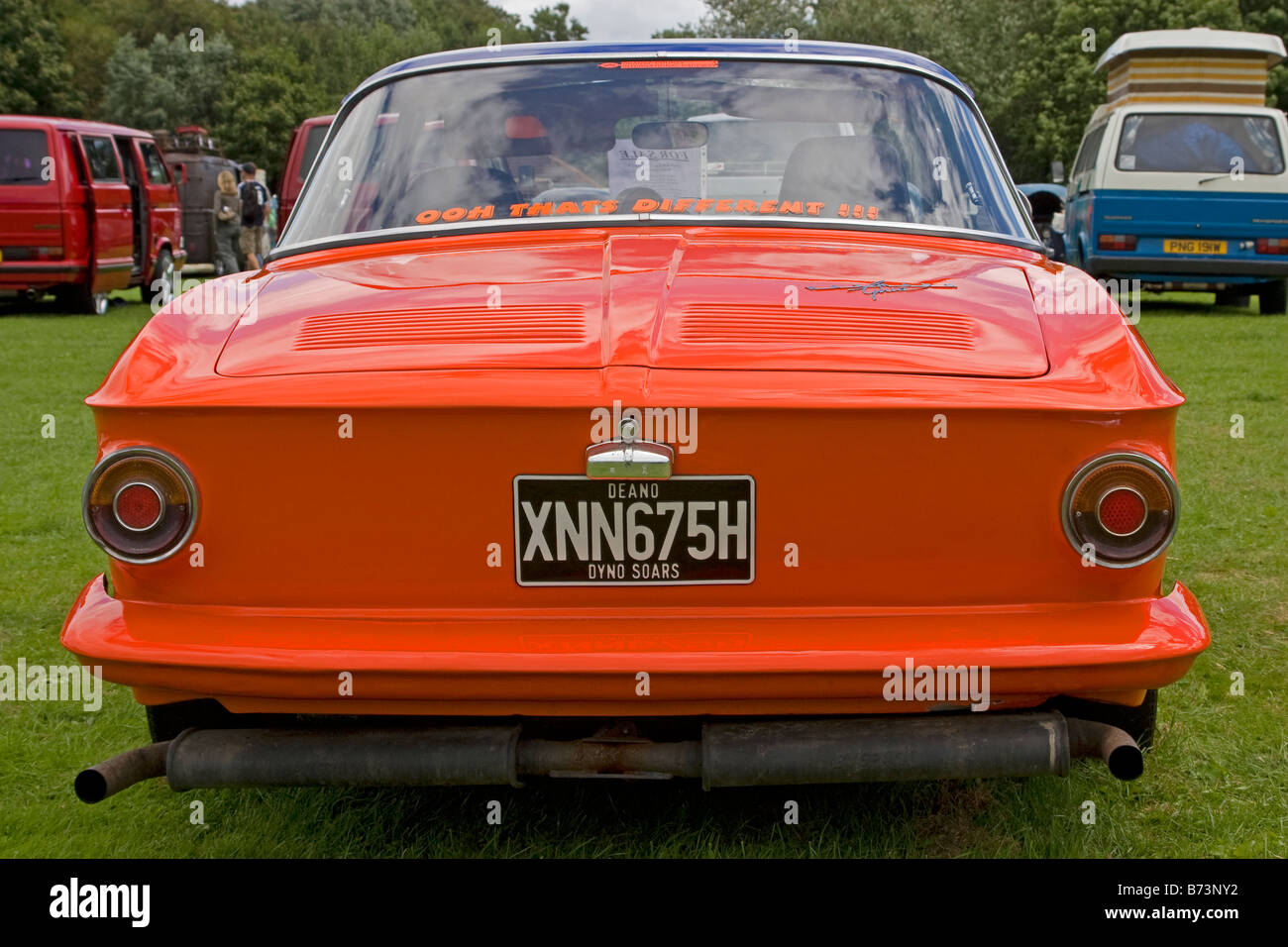 Rear of an orange classic car Stock Photo - Alamy
