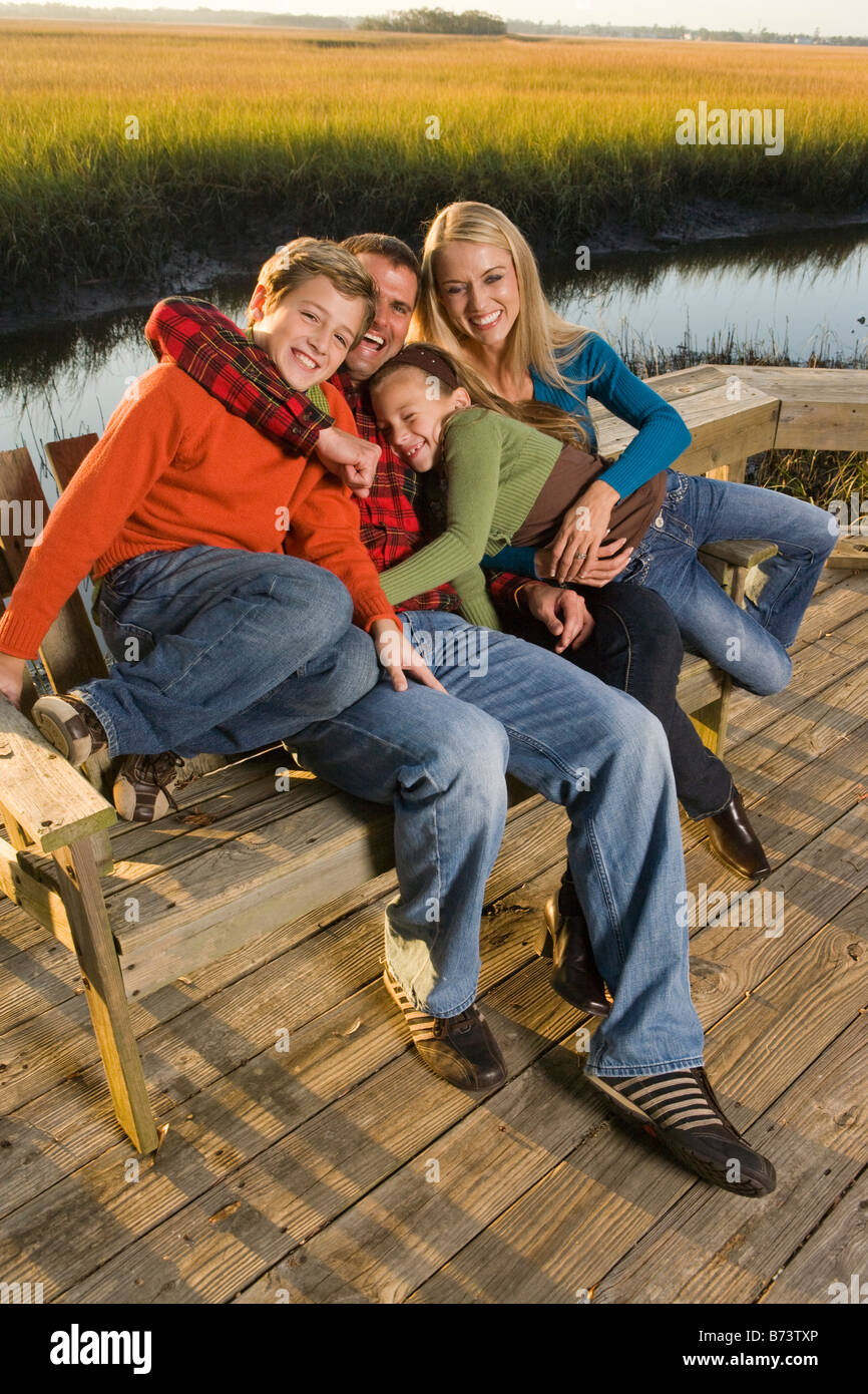 Family playing around bench hi-res stock photography and images - Alamy