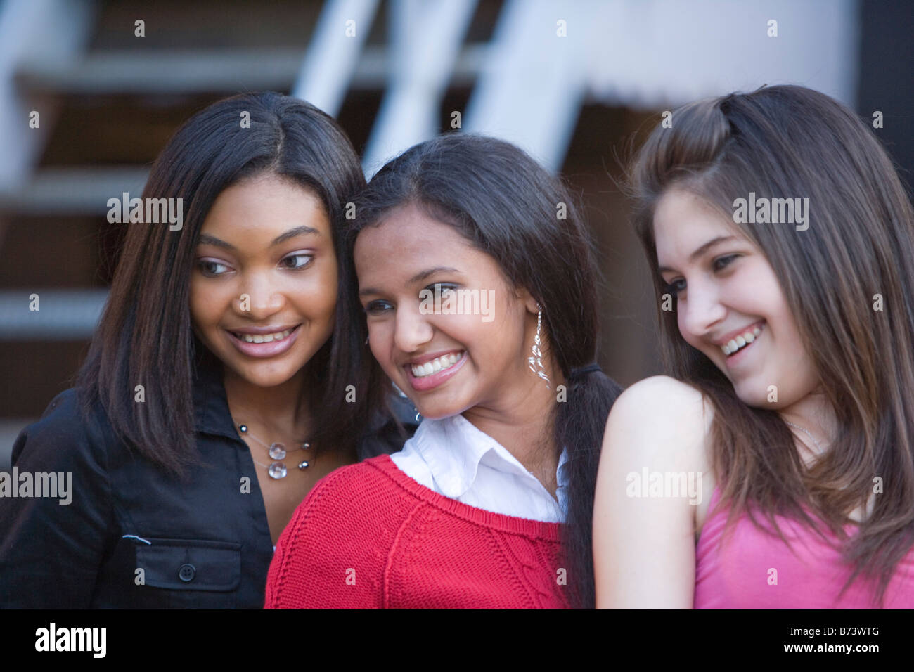 Three happy teenage girls posing outside, head and shoulders Stock ...