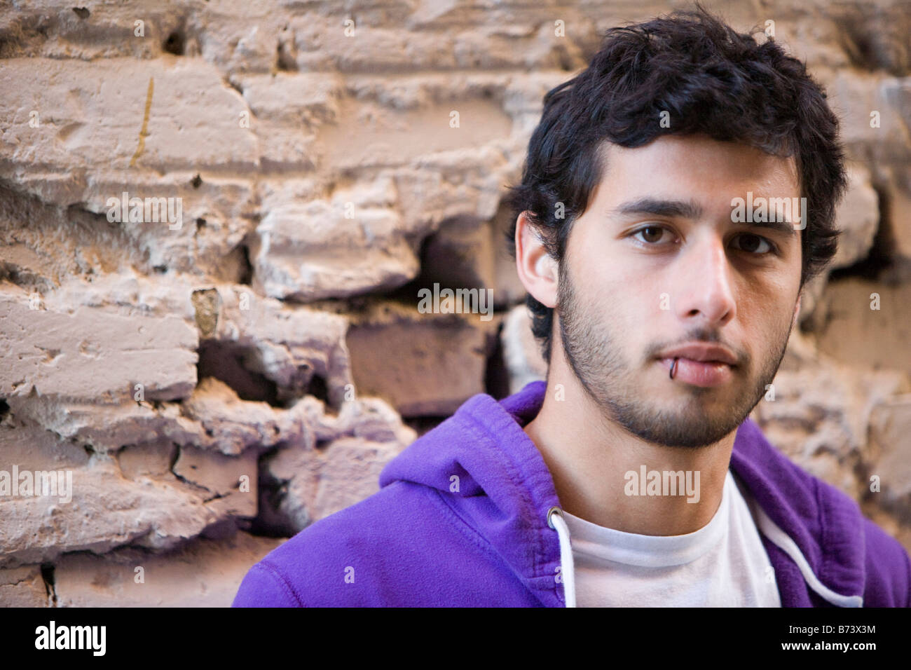 Man teenager lip piercing hi-res stock photography and images - Alamy