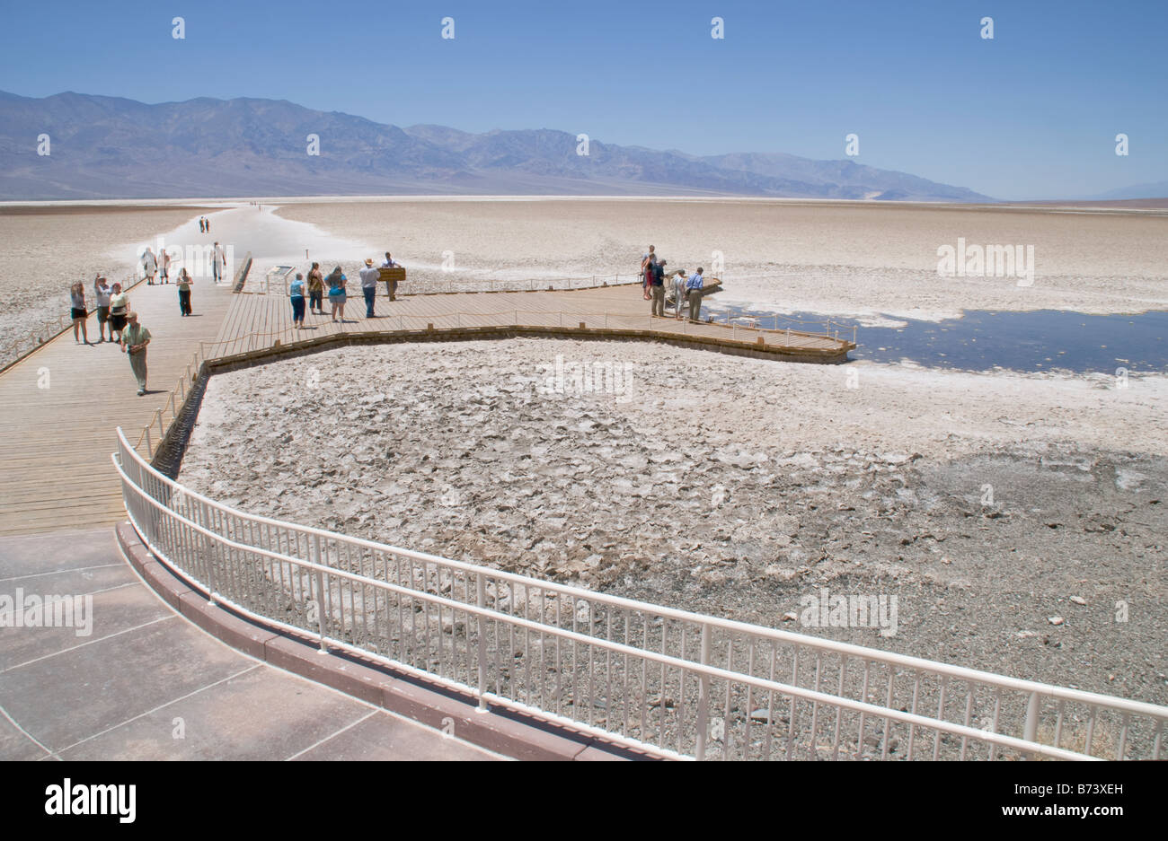 Tourists explore Badwater Basin in Death Valley 282 feet below sea ...