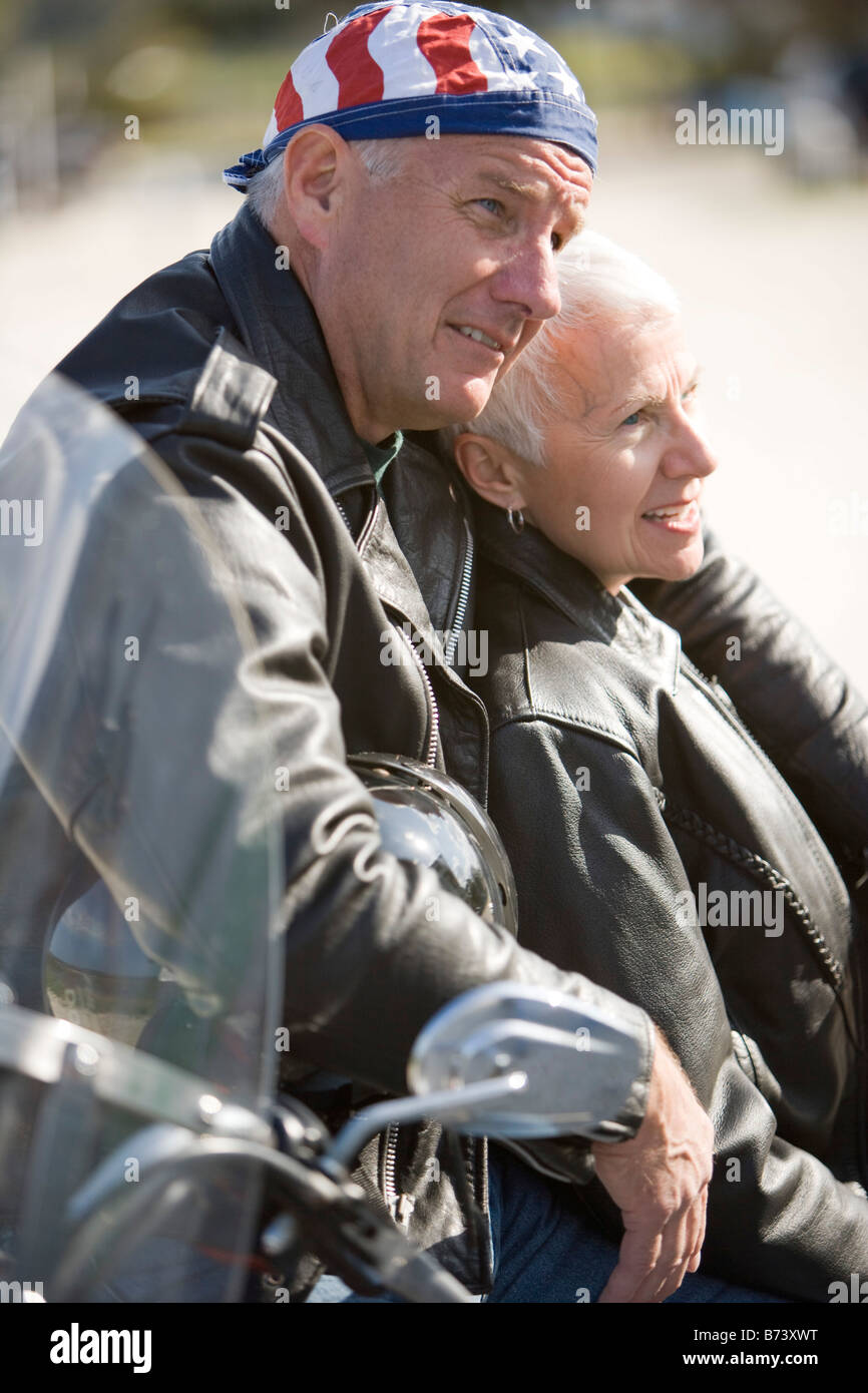 Woman leaning against motorcycle hi-res stock photography and images ...