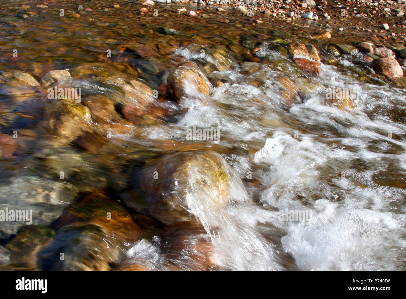 Water over stones hi-res stock photography and images - Alamy