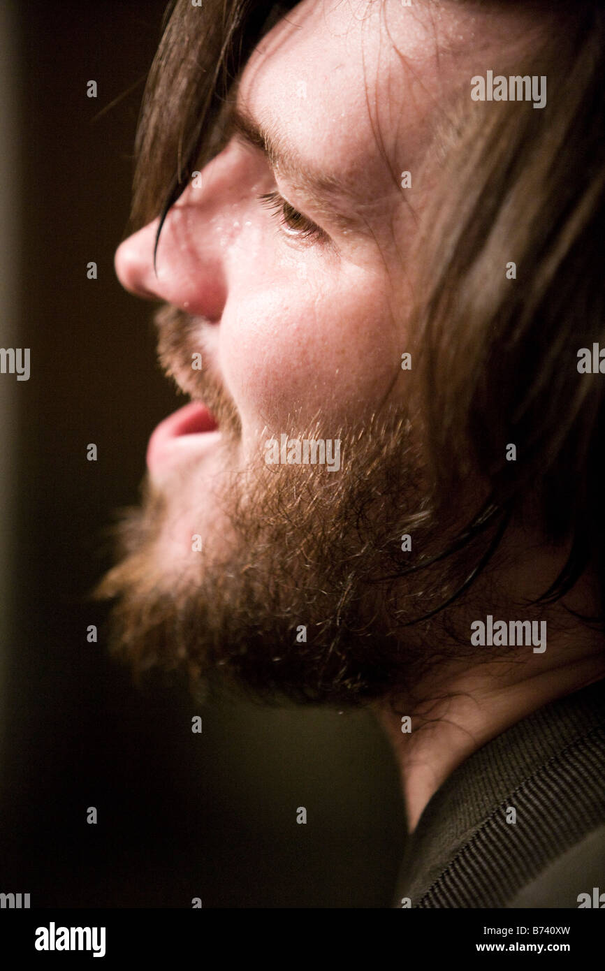 Side profile young man singing hi-res stock photography and images - Alamy
