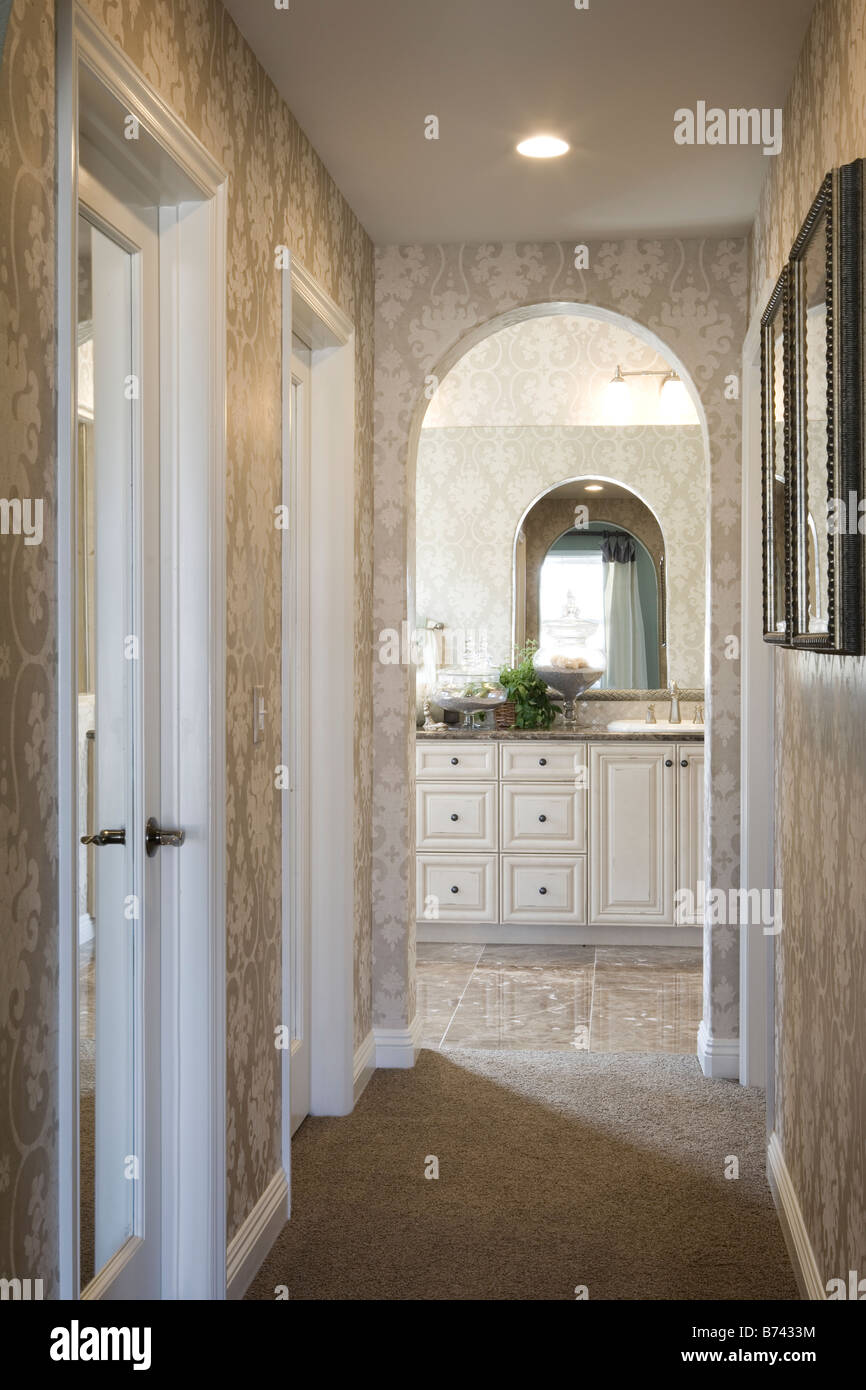 View down hallway to bathroom Stock Photo - Alamy