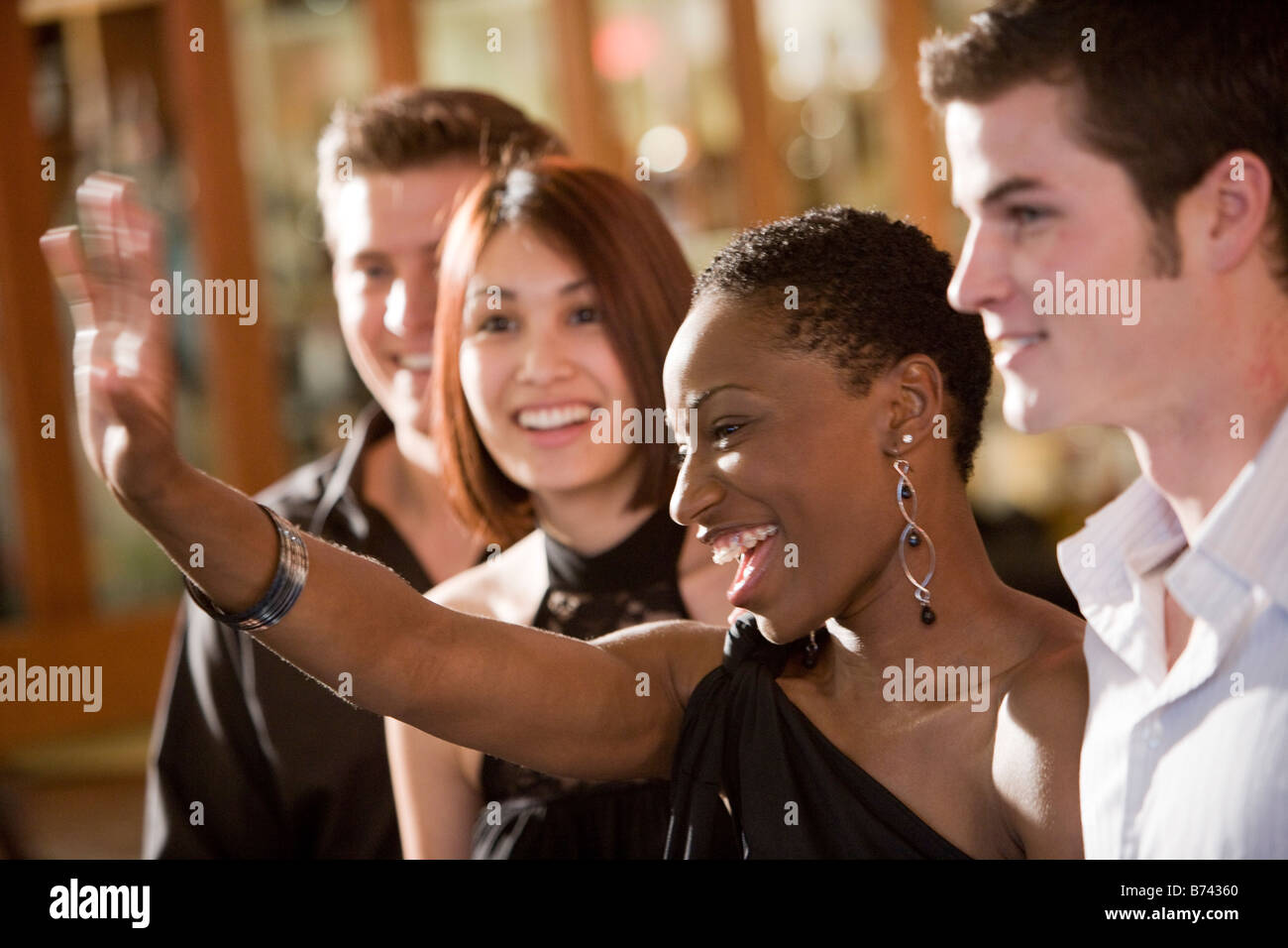 Waving friends restaurant hi-res stock photography and images - Alamy