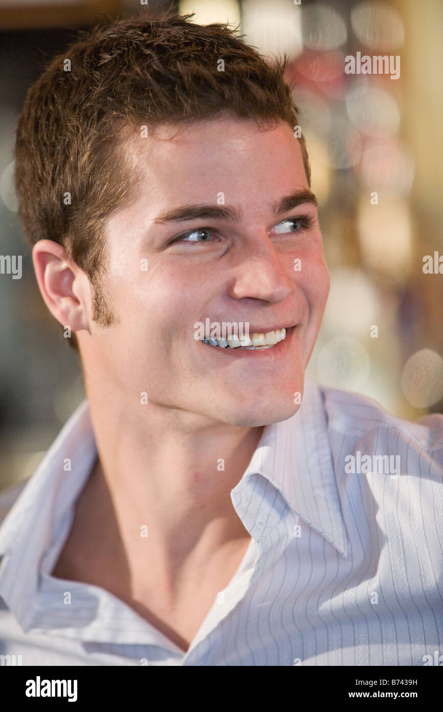 Headshot of a confident handsome young man Stock Photo - Alamy