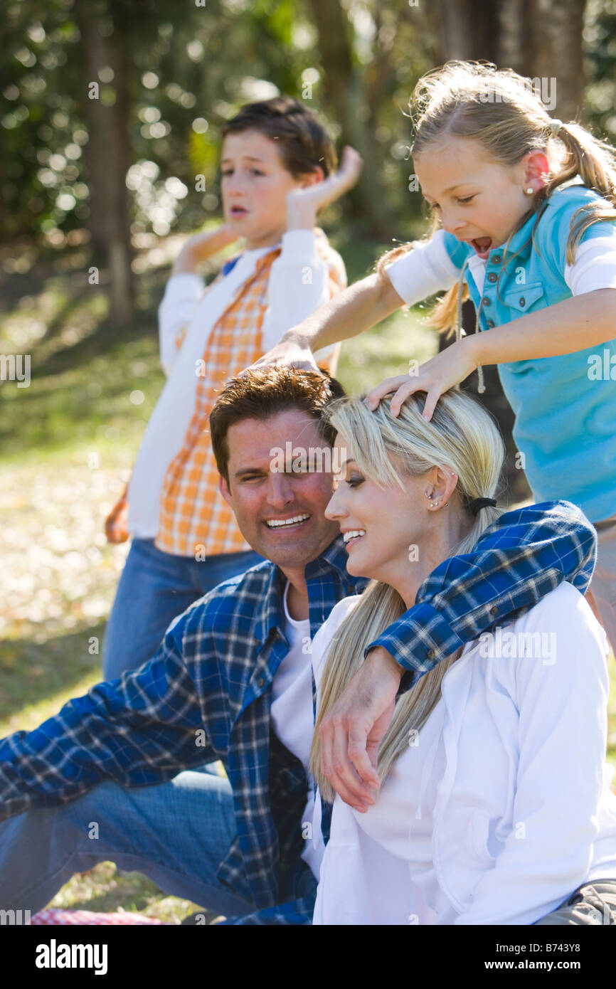 Family having fun together at the park Stock Photo - Alamy