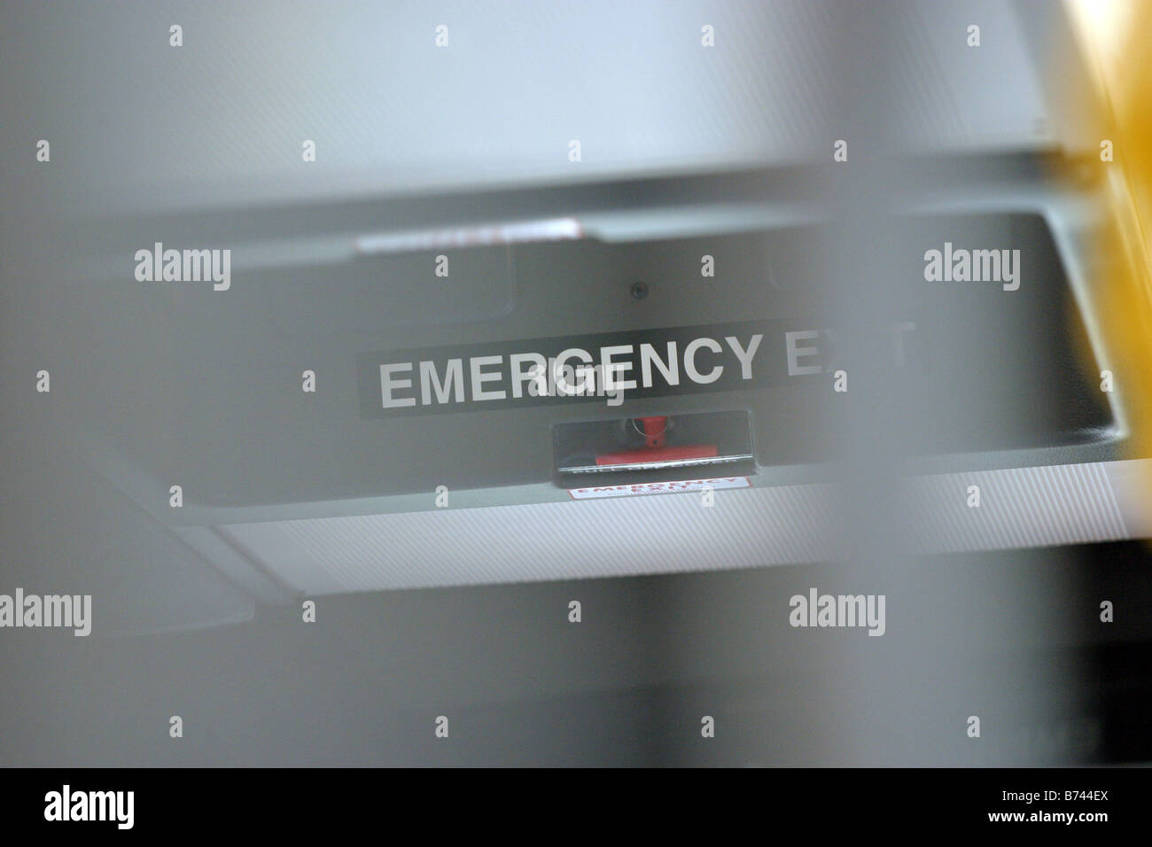 Emergency exit sign in a bendy bus Stock Photo - Alamy