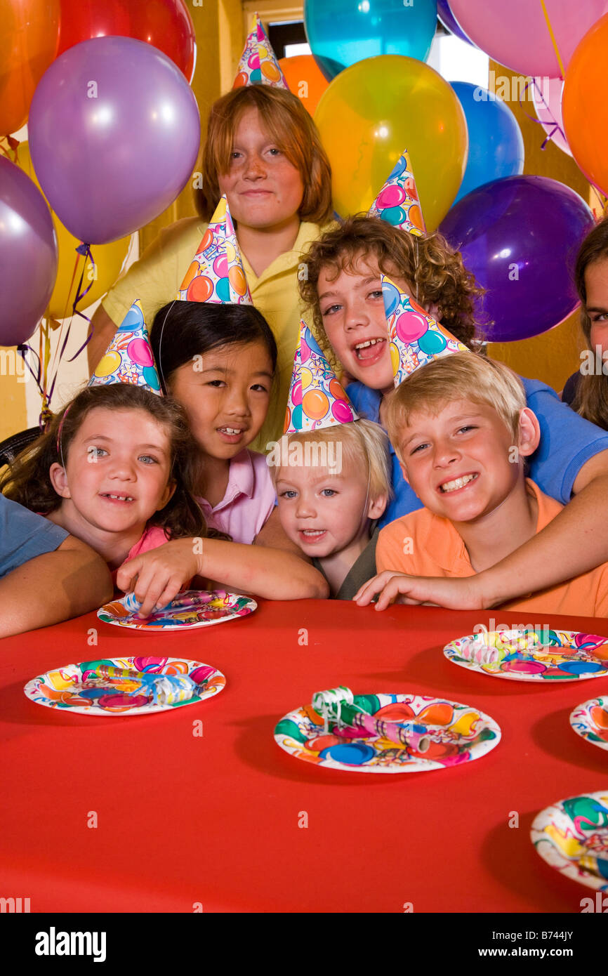 Group of children having fun at birthday party Stock Photo - Alamy