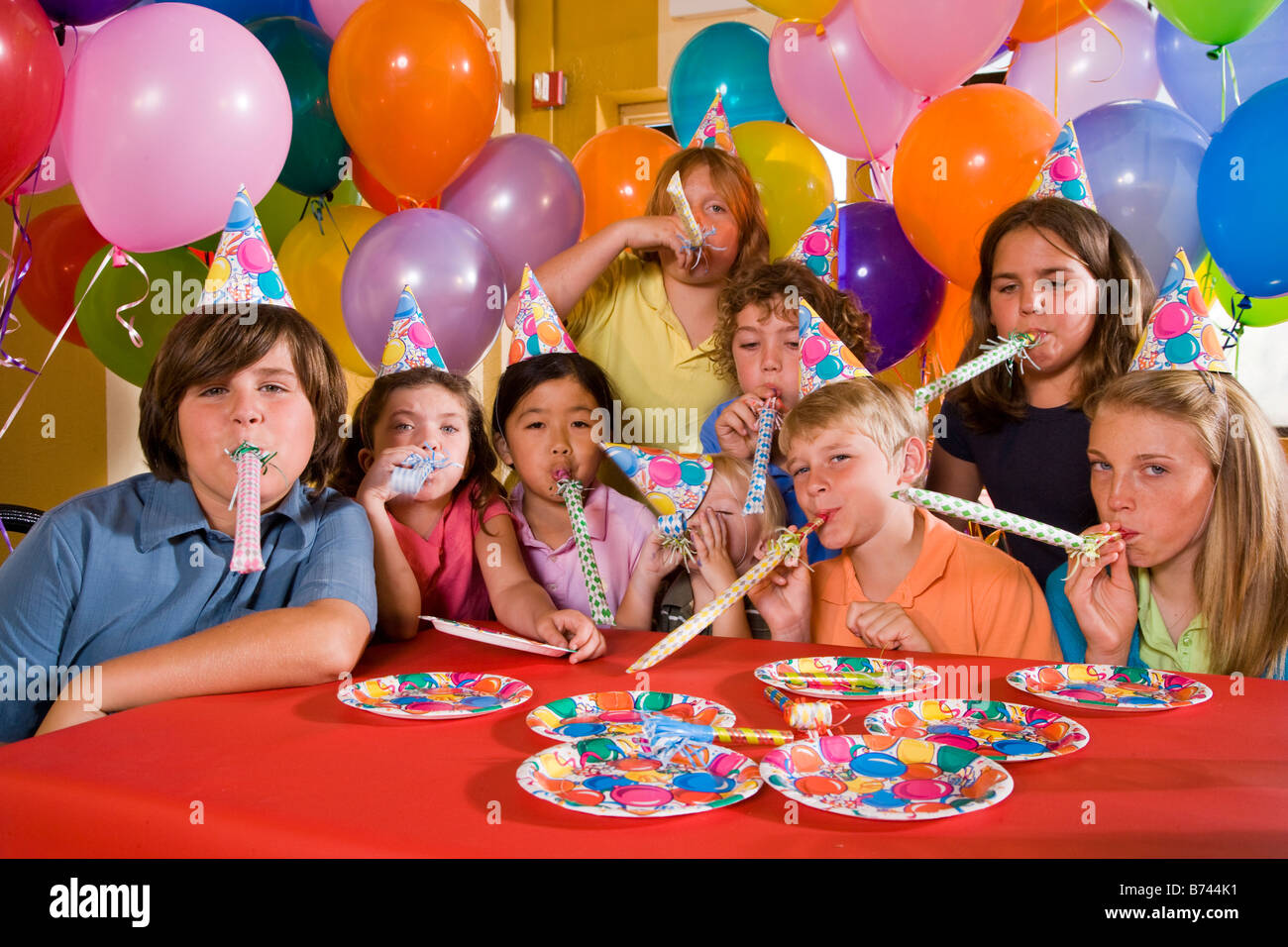 Group of children having fun at birthday party Stock Photo - Alamy
