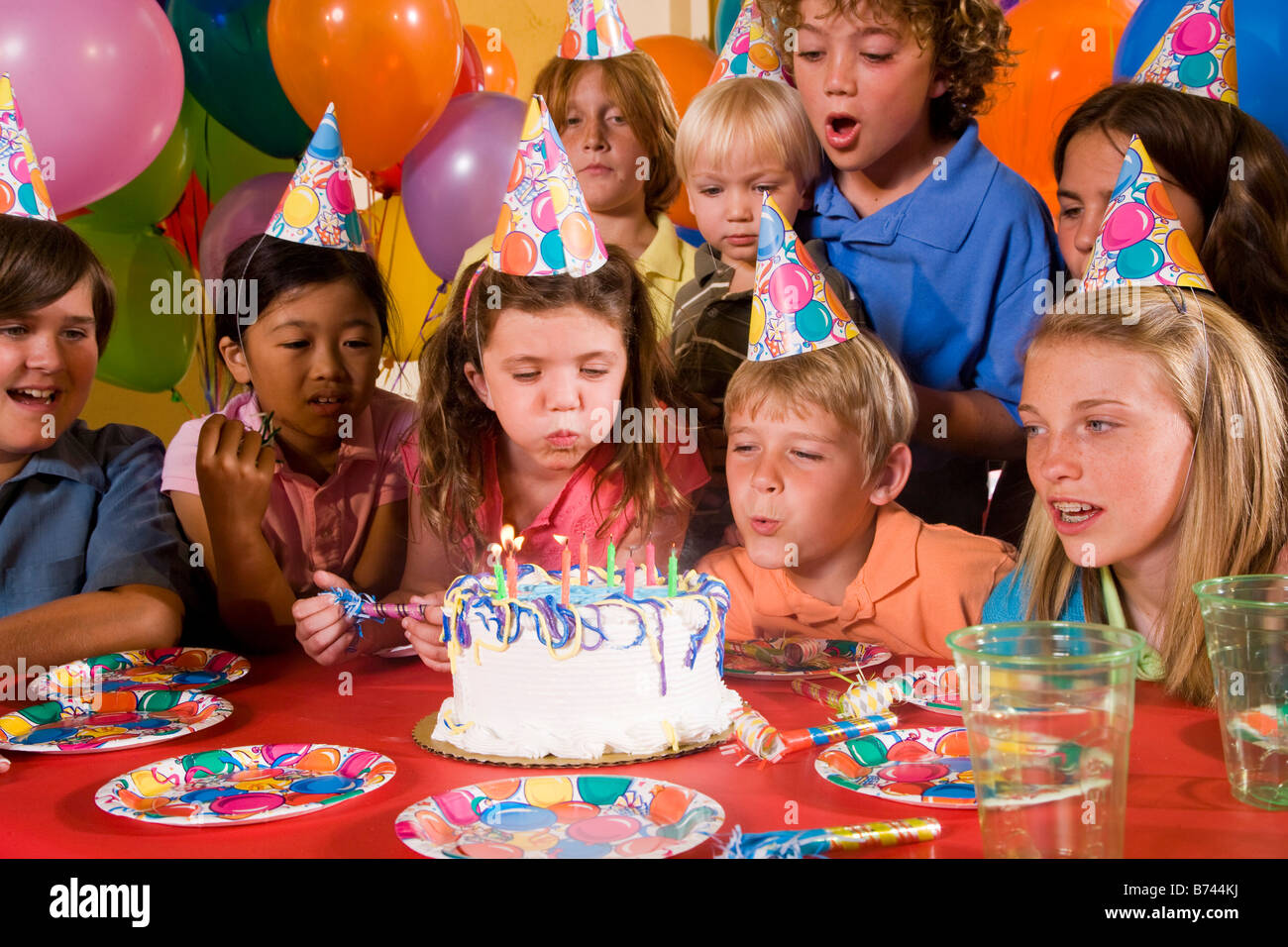 Group of children having fun at birthday party Stock Photo - Alamy