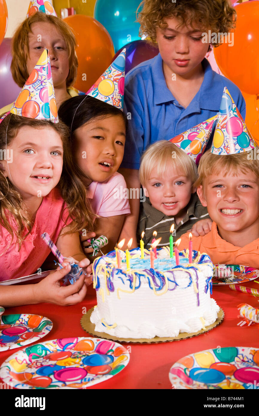Excited kids enjoying birthday party hi-res stock photography and ...