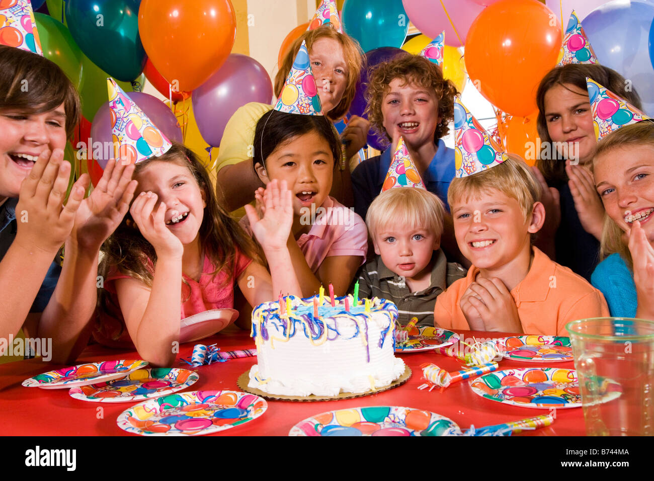Excited kids enjoying birthday party hi-res stock photography and ...