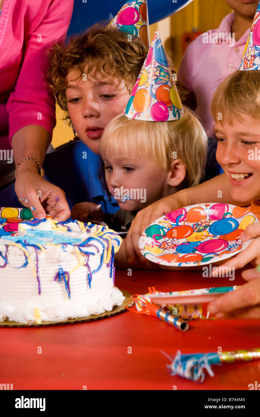 Excited kids enjoying birthday party hi-res stock photography and ...