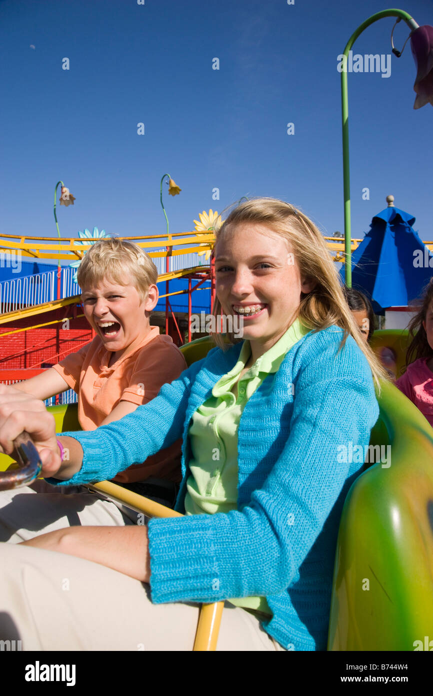 Children riding a roller coaster hi-res stock photography and images ...