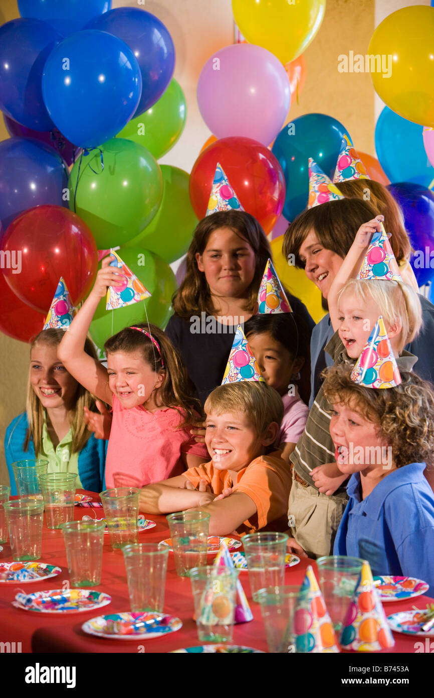 Kids having fun at birthday party Stock Photo - Alamy