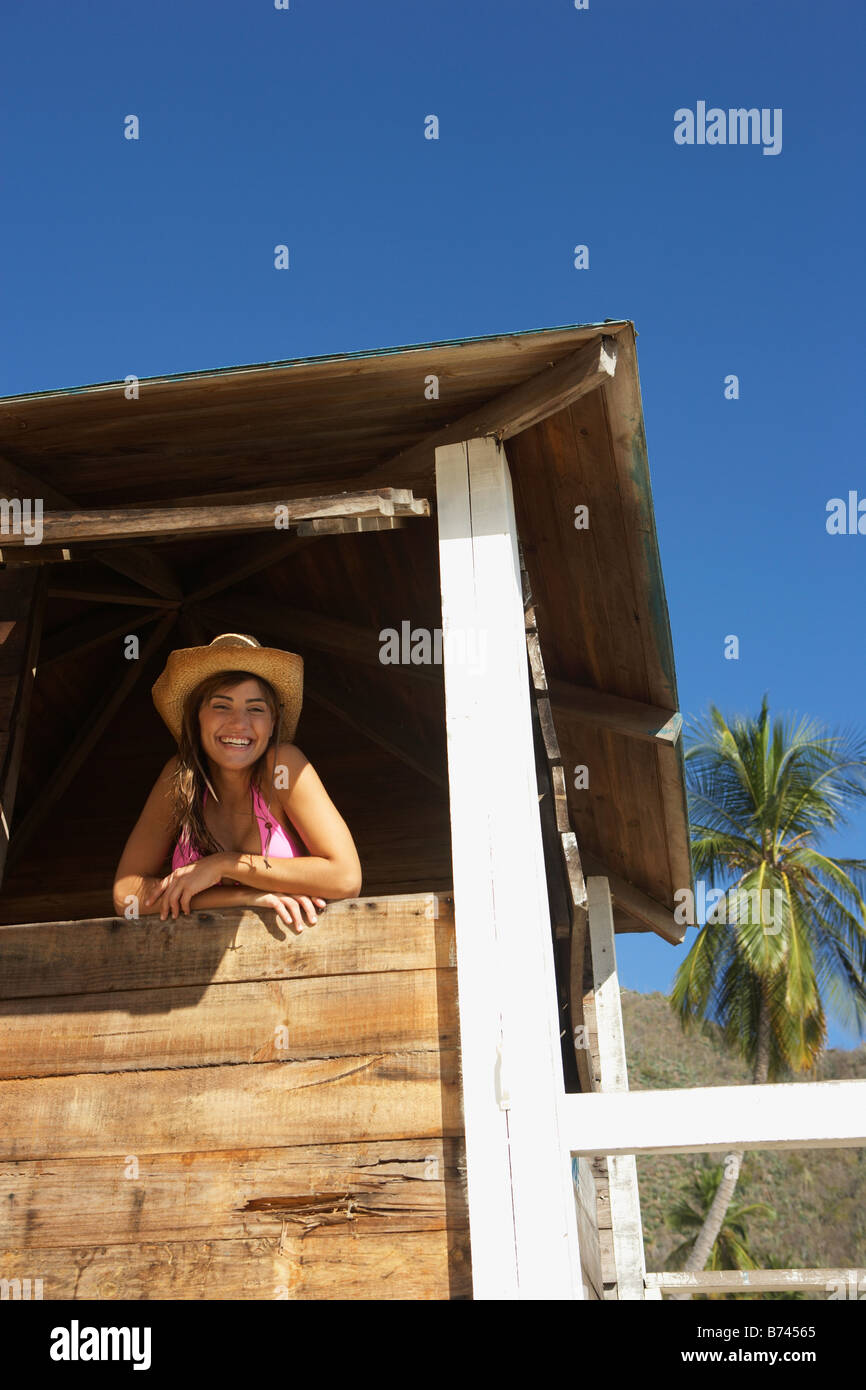 Woman in lifeguard tower at beach Stock Photo - Alamy