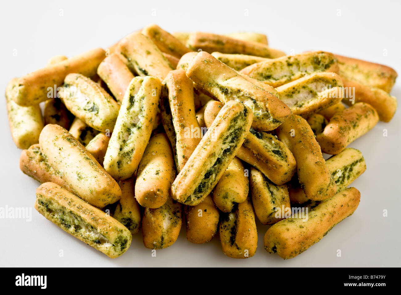 Heap of Grissini snacks with garlic and parsley Stock Photo - Alamy