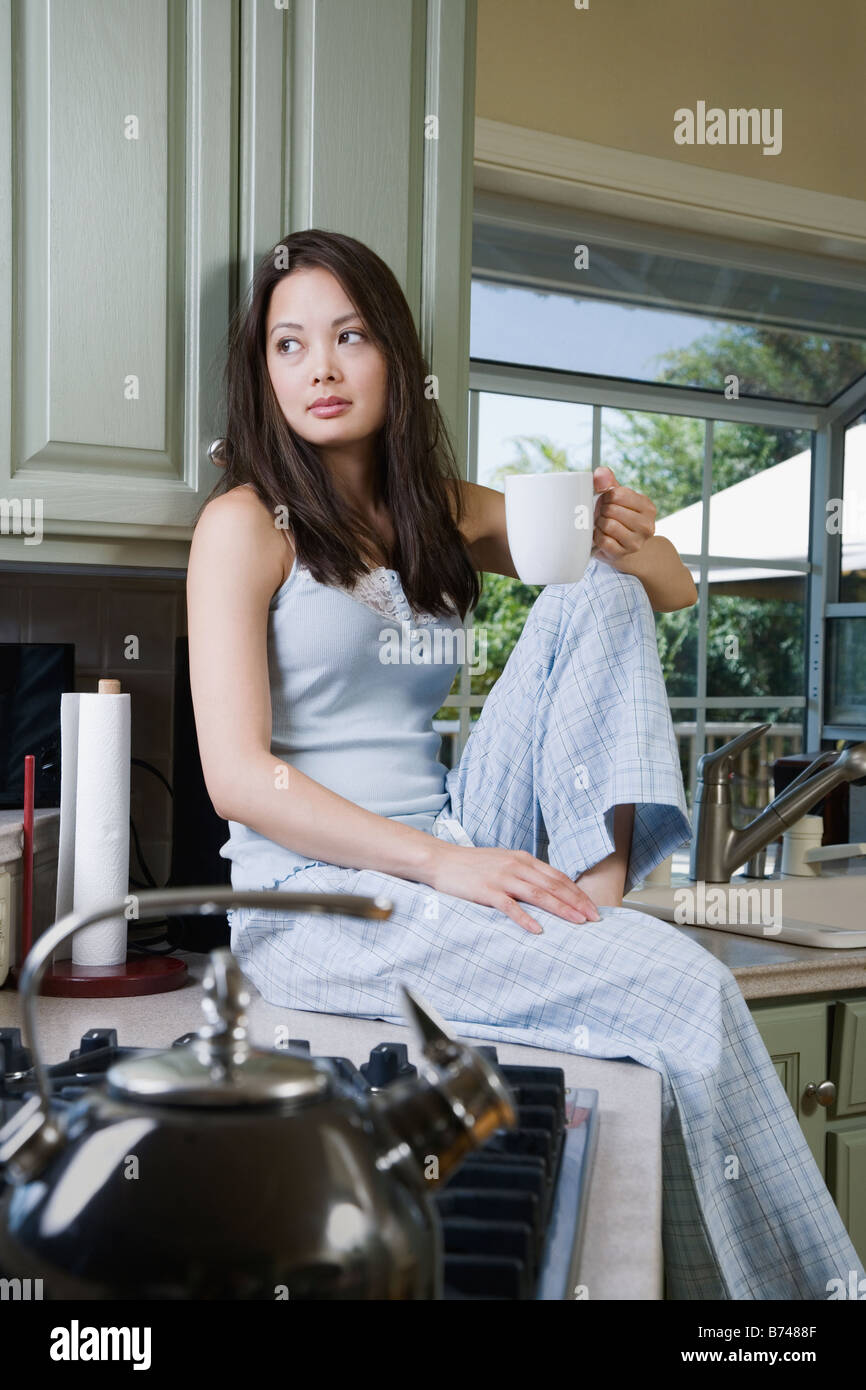 Woman drinking coffee in morning Stock Photo - Alamy