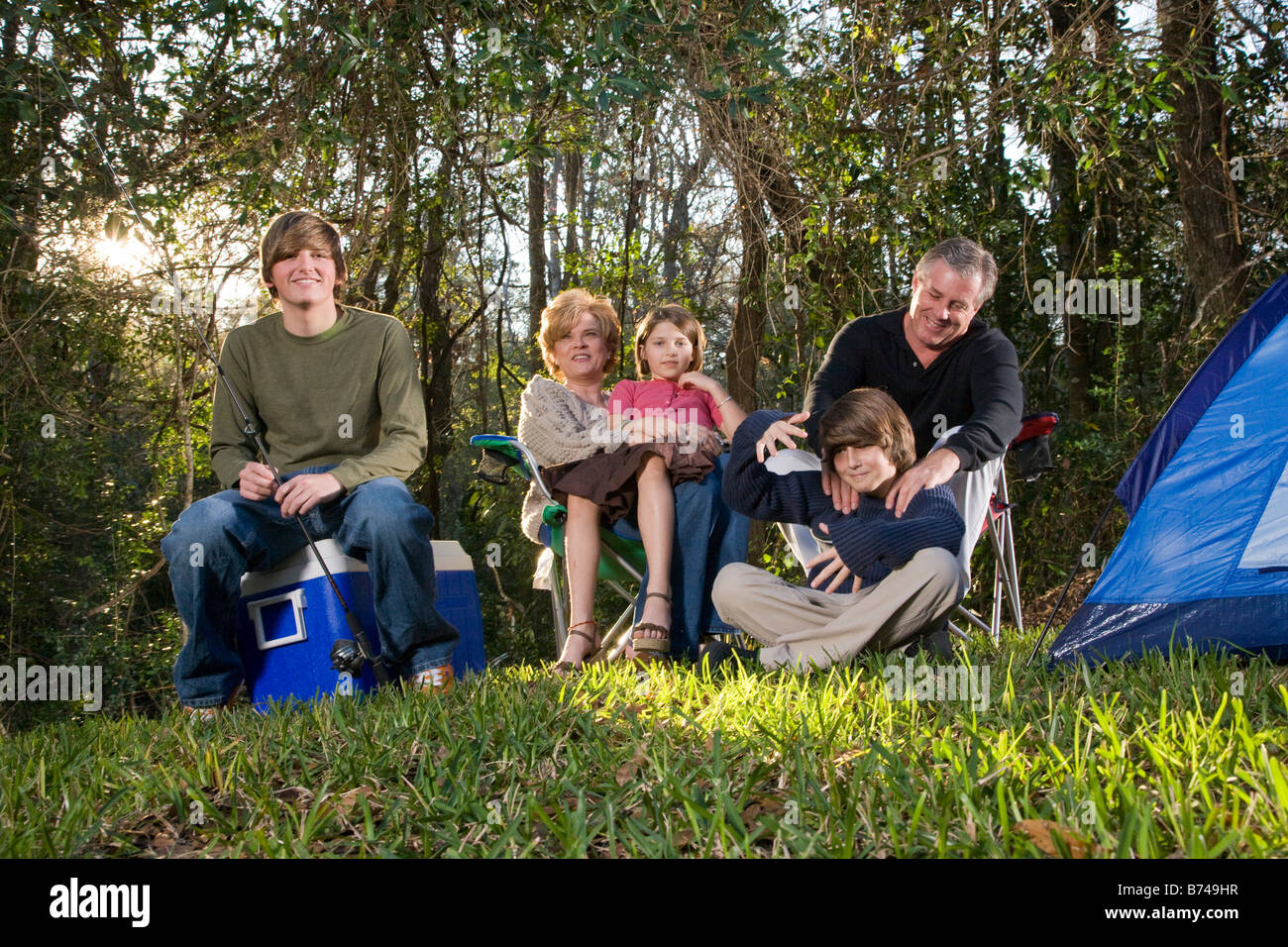 Portrait of family together on camping trip at campsite Stock Photo - Alamy