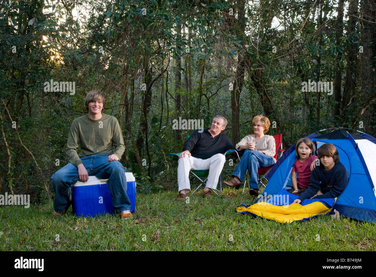 Portrait of family together on camping trip at campsite Stock Photo - Alamy