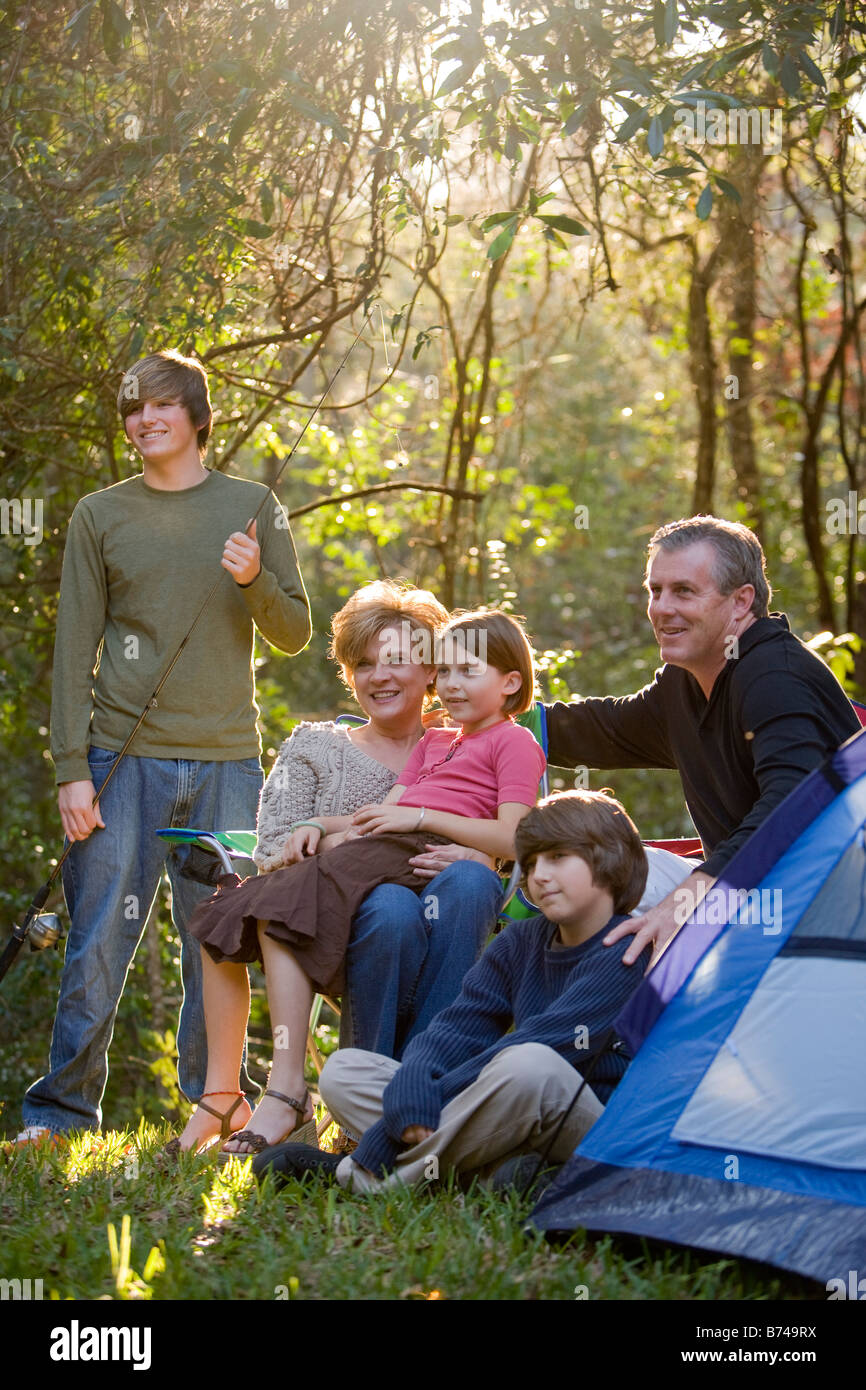 Portrait of family together on camping trip by tent Stock Photo - Alamy