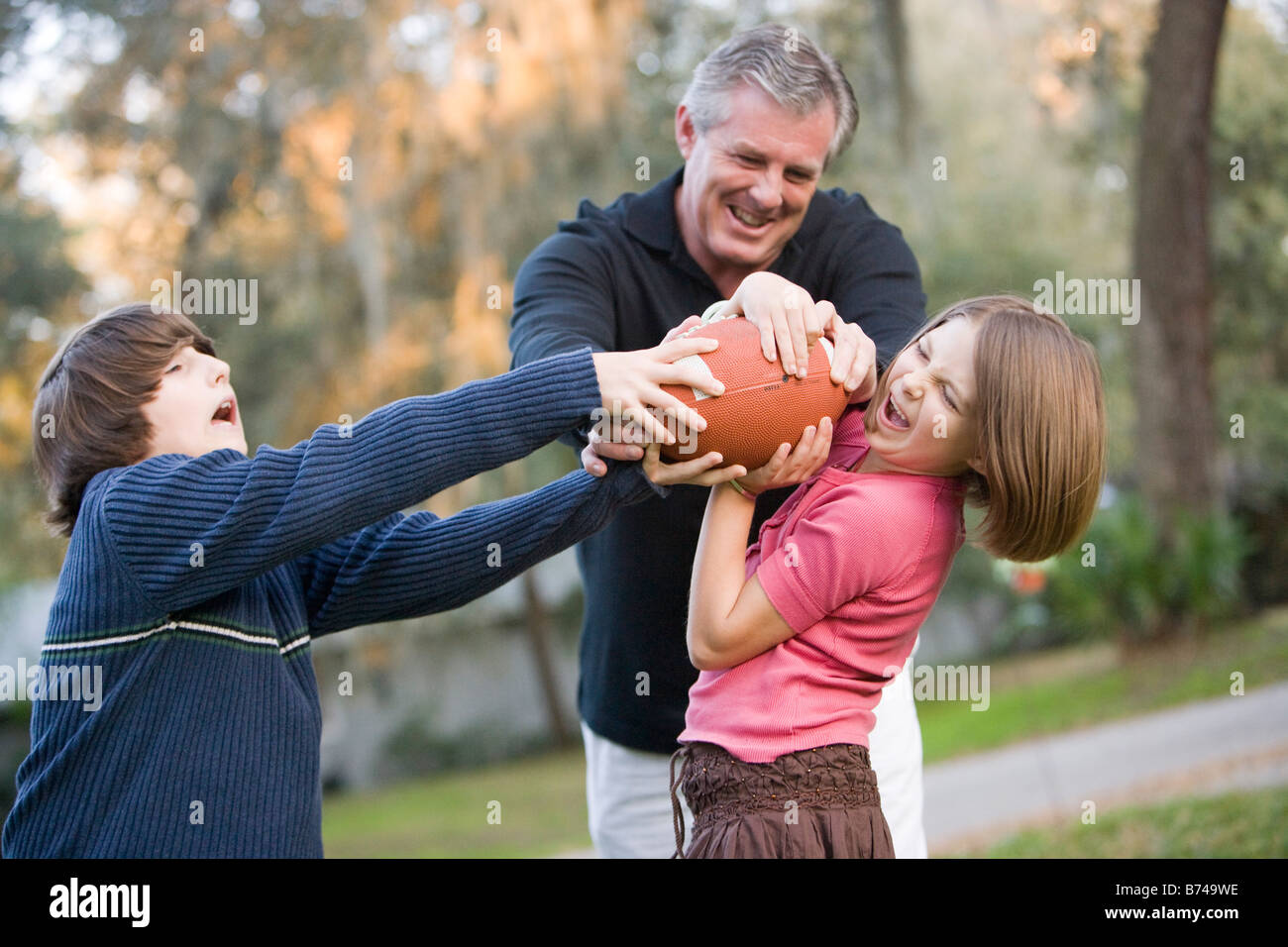 Two children playing football on hi-res stock photography and images ...