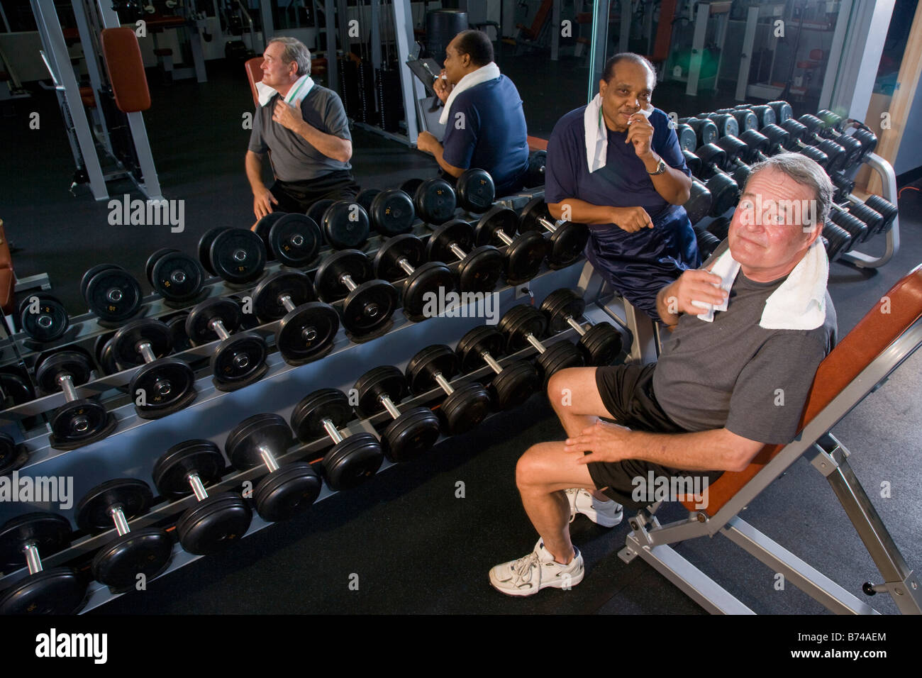 Portrait of senior men working out at gym Stock Photo - Alamy