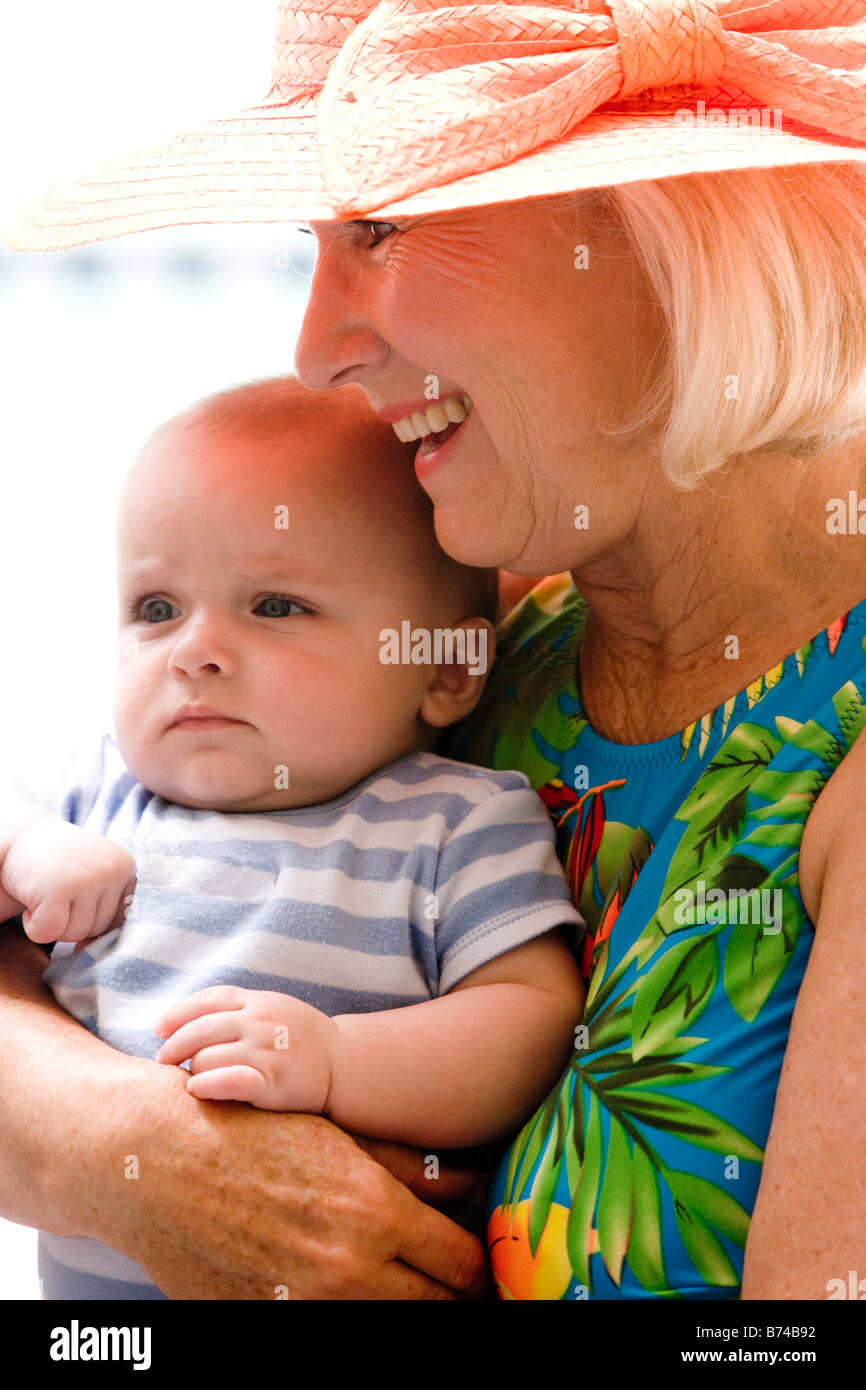 Happy grandmother hugging grandchildren hi-res stock photography and ...