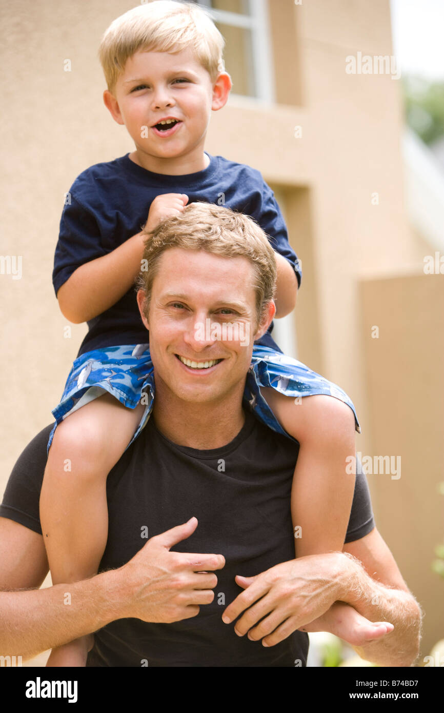 Ride dad shoulder hi-res stock photography and images - Alamy