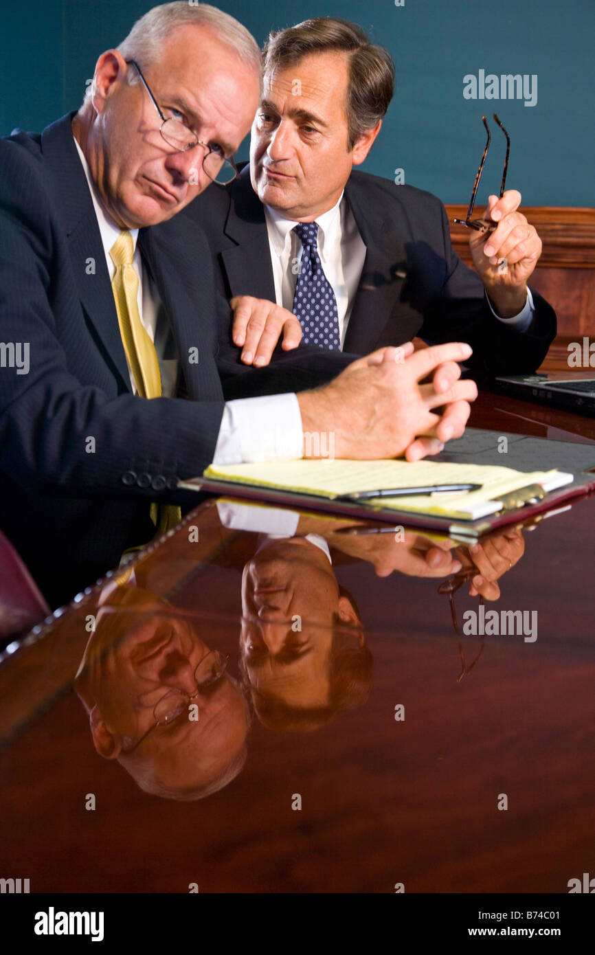 Meeting two men senior serious table hi-res stock photography and ...
