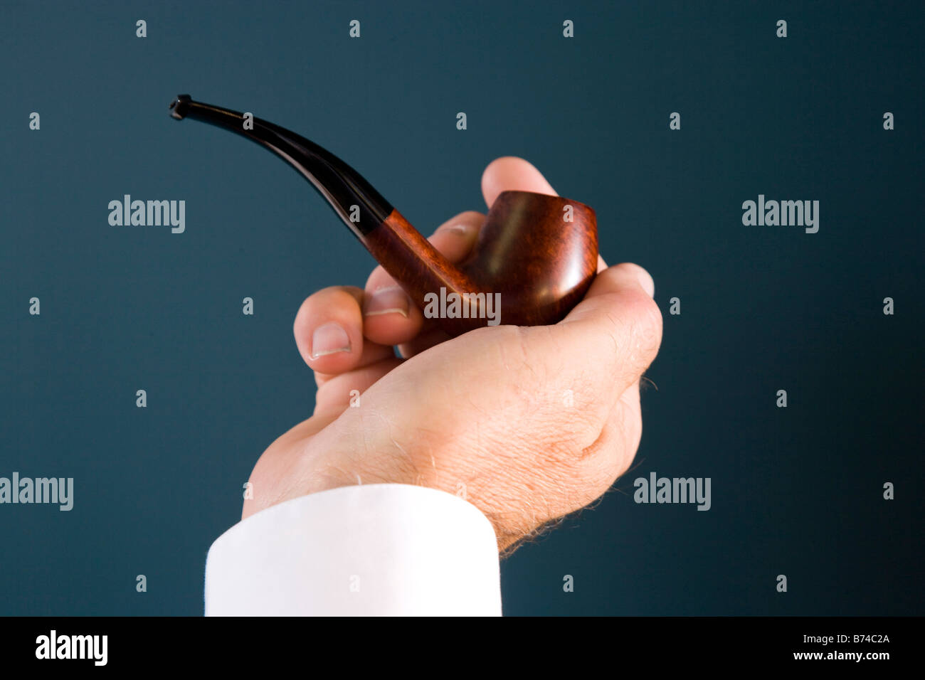 Hand holding pipe hi-res stock photography and images - Alamy
