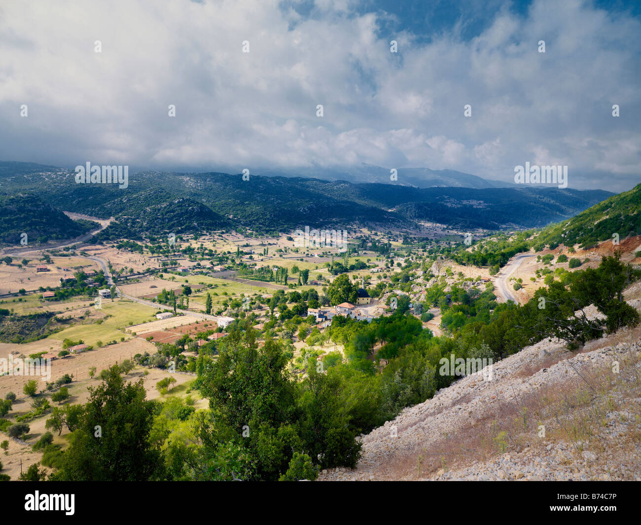 A sunny view over a valley in the mountains behind Kas, Turkey showing ...