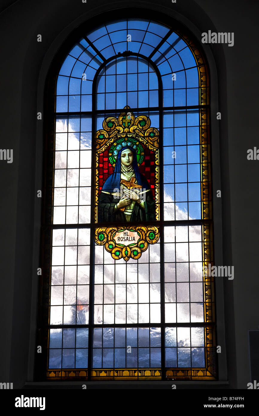 Stained glass church window with snowy Swiss Alps beyond, Zermatt ...