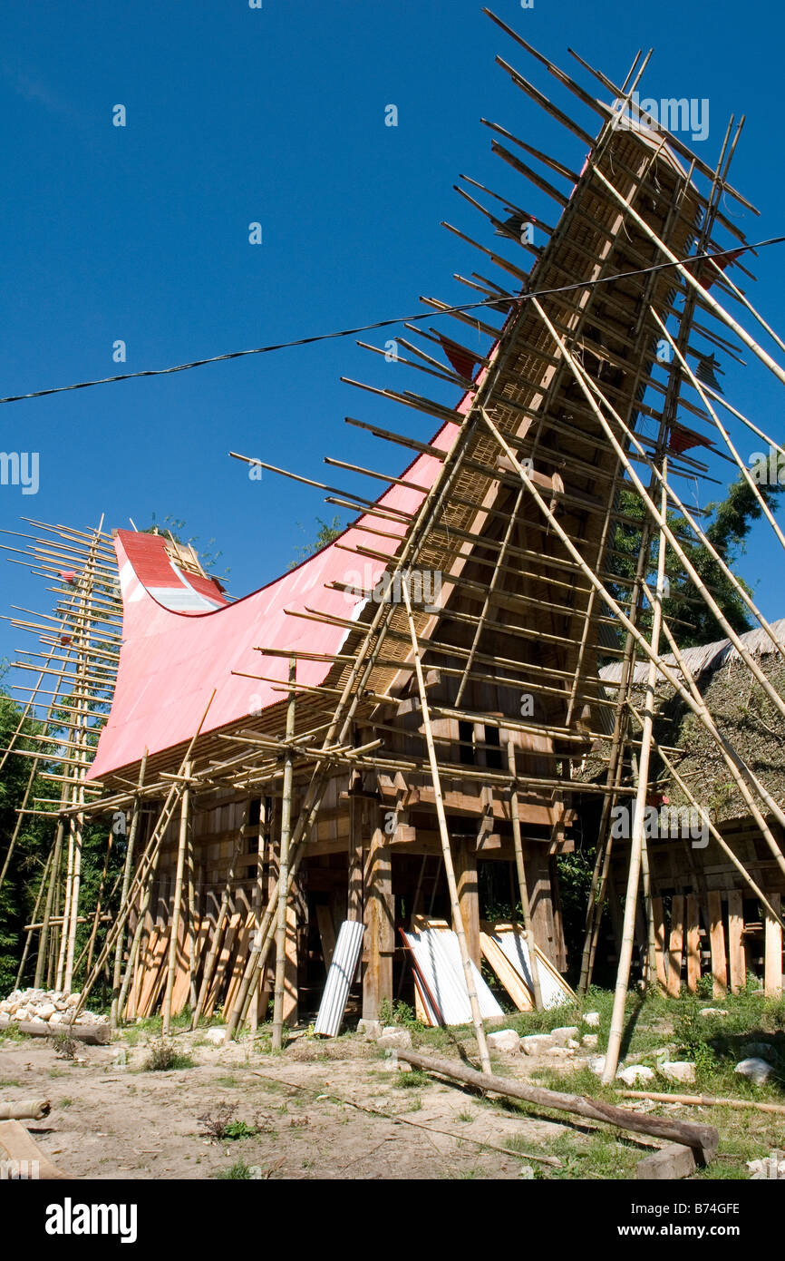 A traditional Torajan house under construction (Sulawesi - Indonesia ...