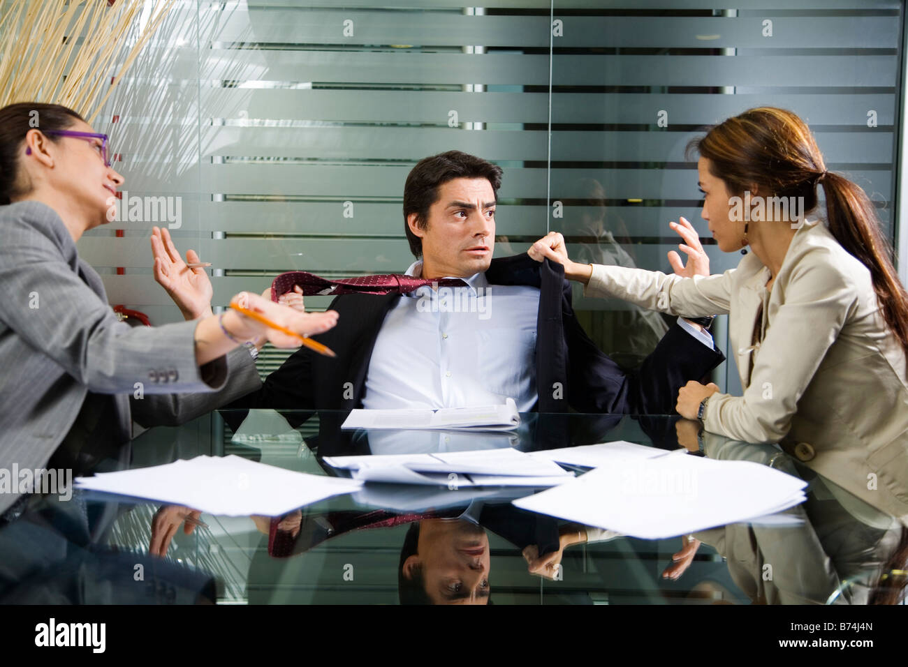 Office life business team having a fight Stock Photo - Alamy