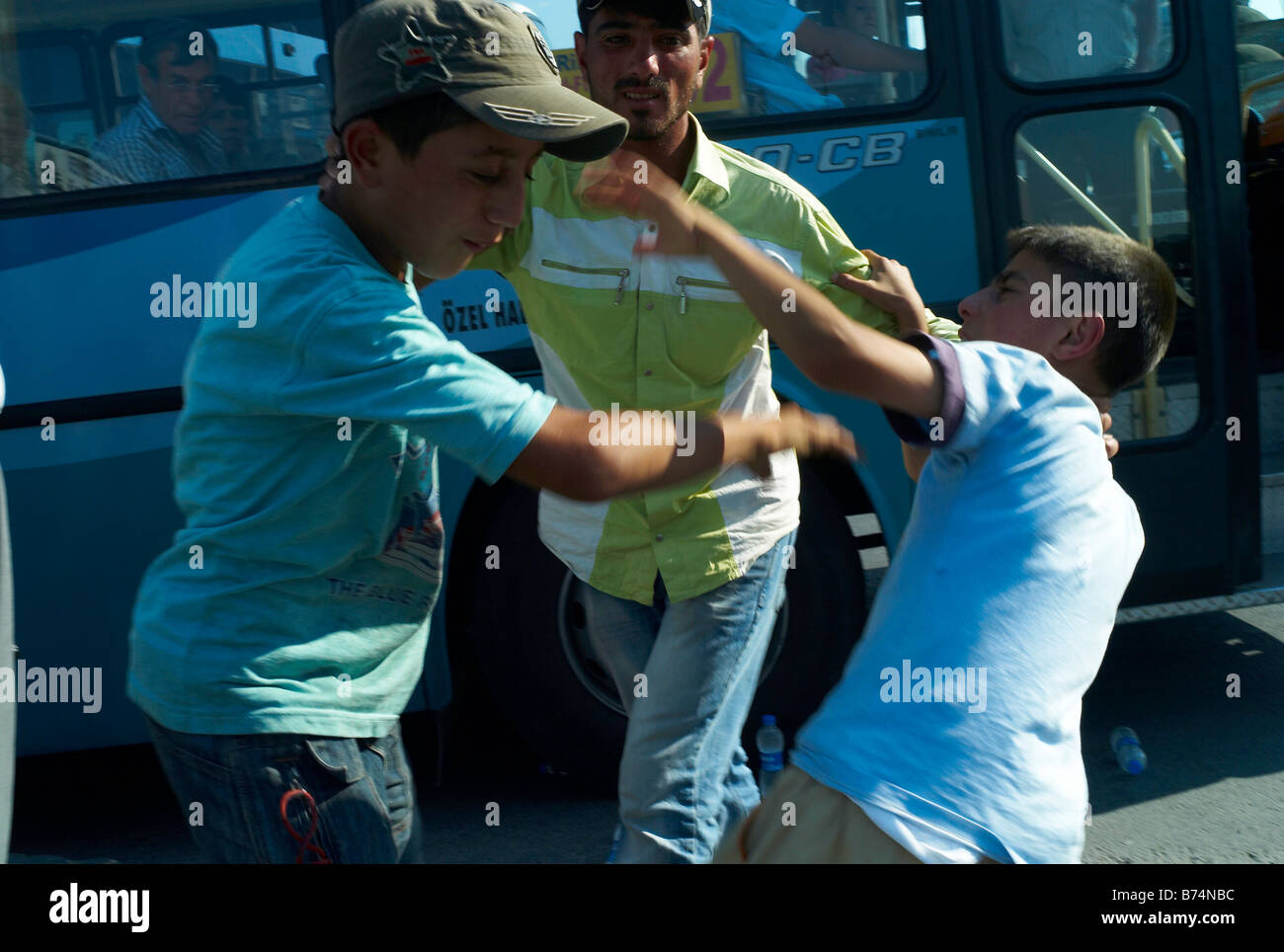 02 july 2008 two young water sellers fight at the main bus station in ...