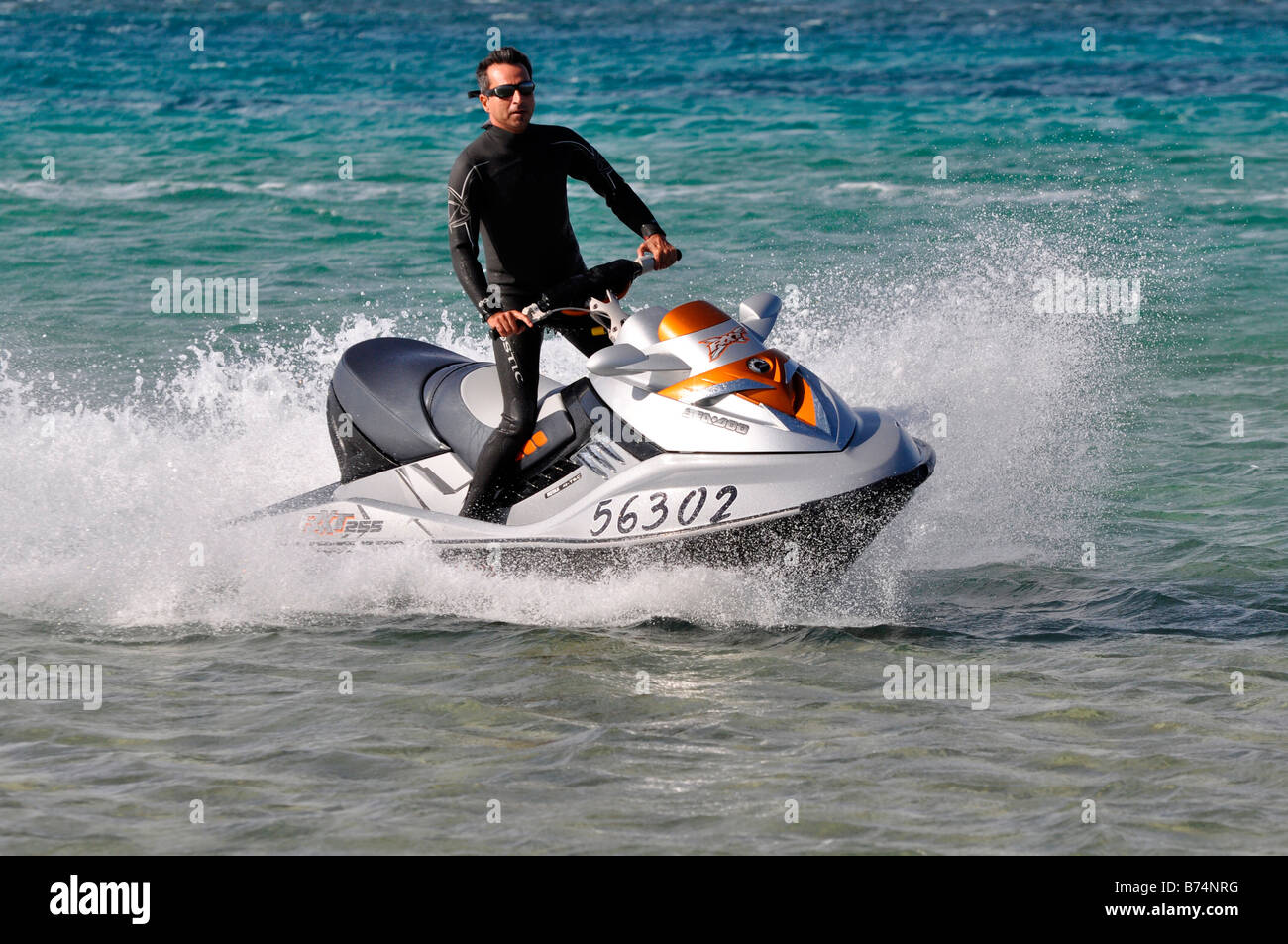 Jet ski man action hi-res stock photography and images - Alamy