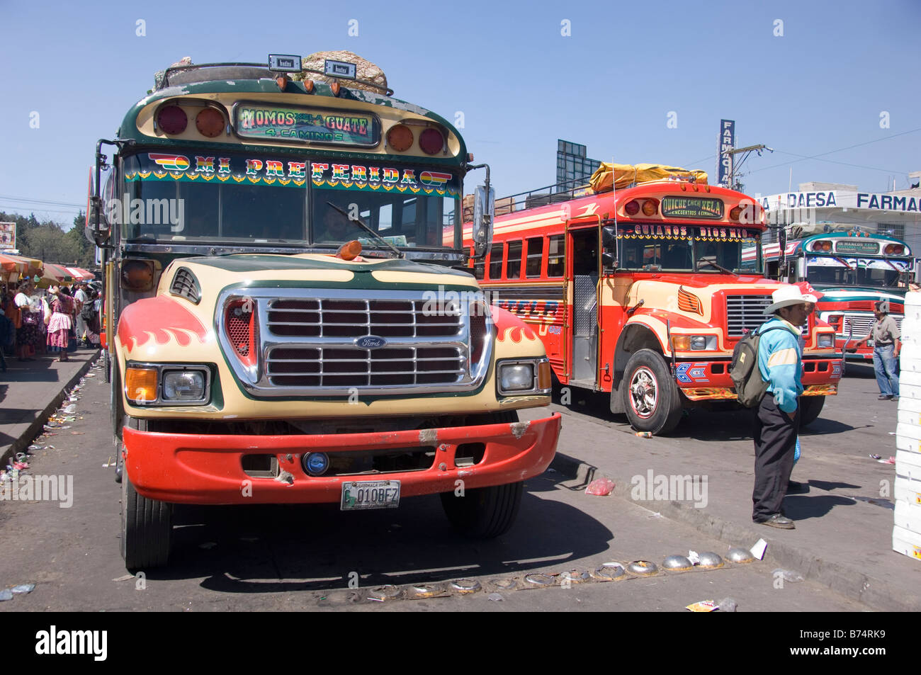 Bus station scene where so called "chicken buses" gather to transport ...
